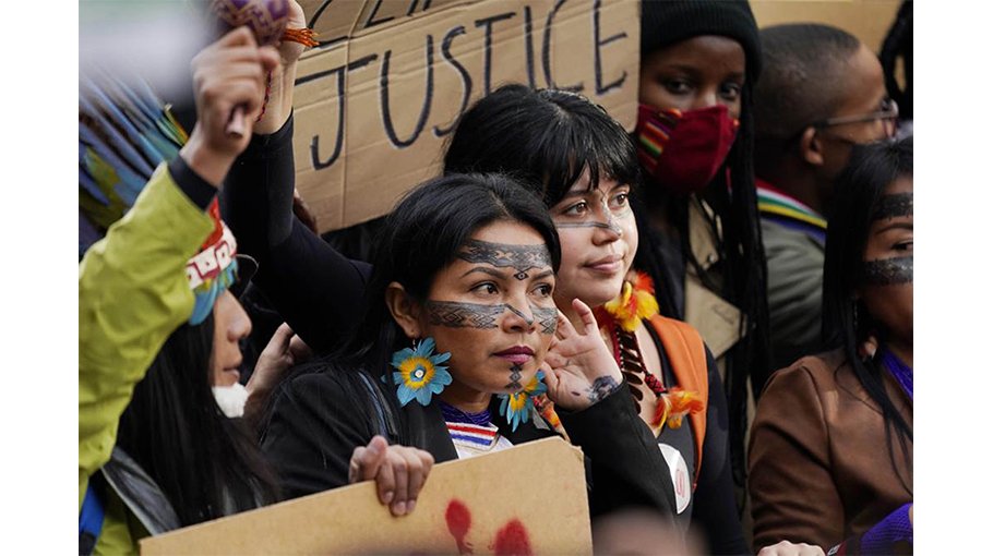 Clean up your mess, youth tell climate talks inside and out ...